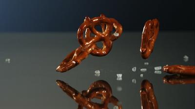 Pretzels falling and bouncing in ultra slow motion (1,500 fps) on a ...